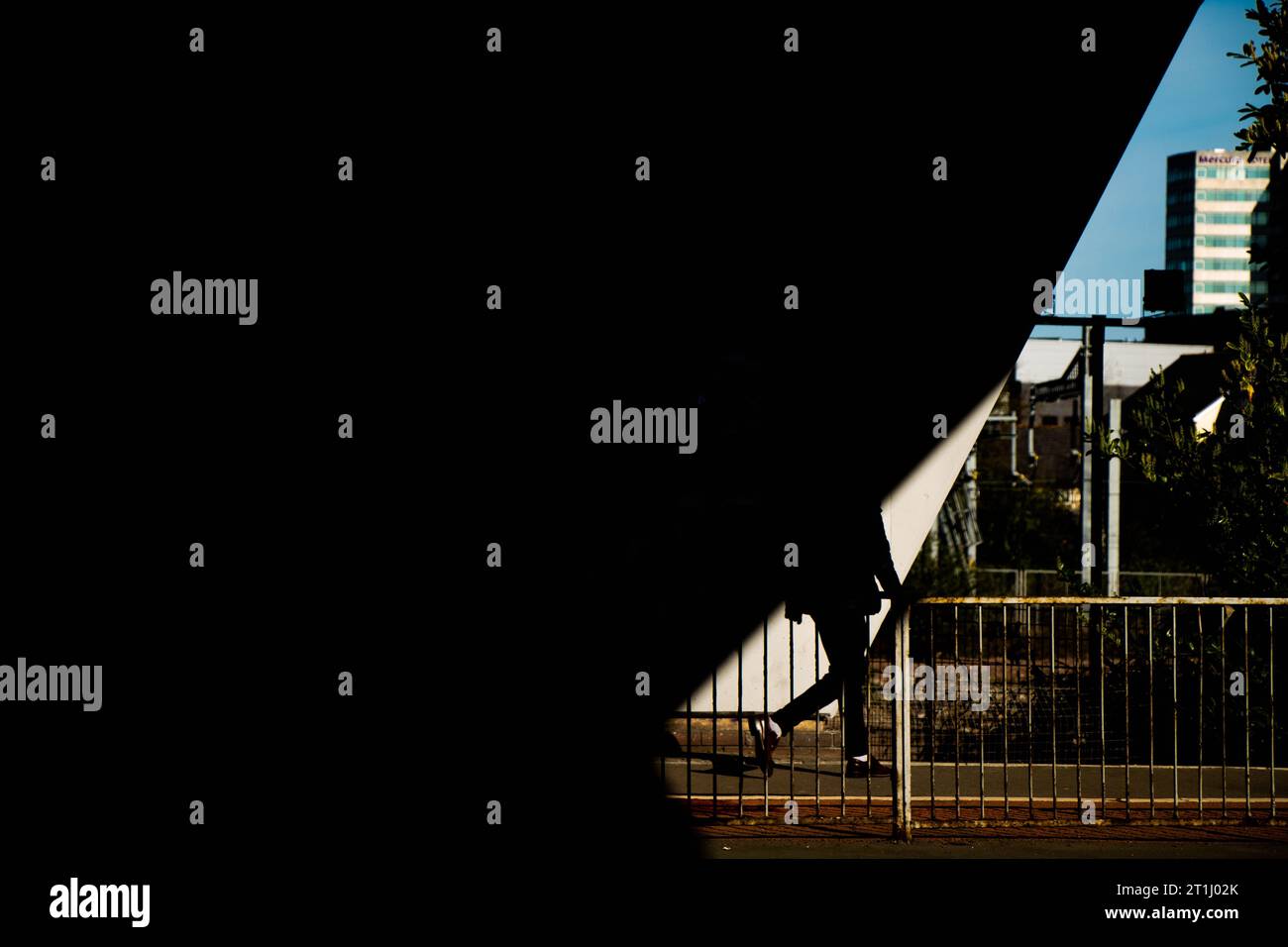 Umbrella shadow walking hi-res stock photography and images - Alamy