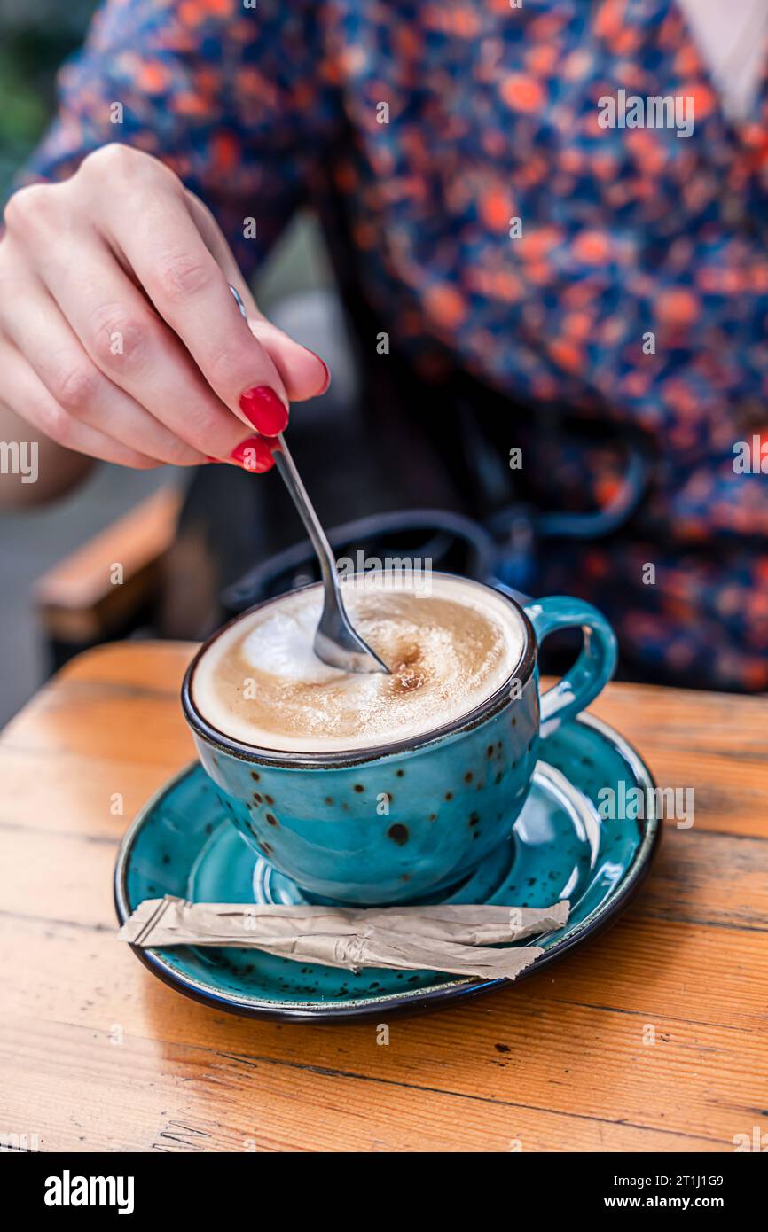 Stirs black tea sugar spoon hi-res stock photography and images - Alamy