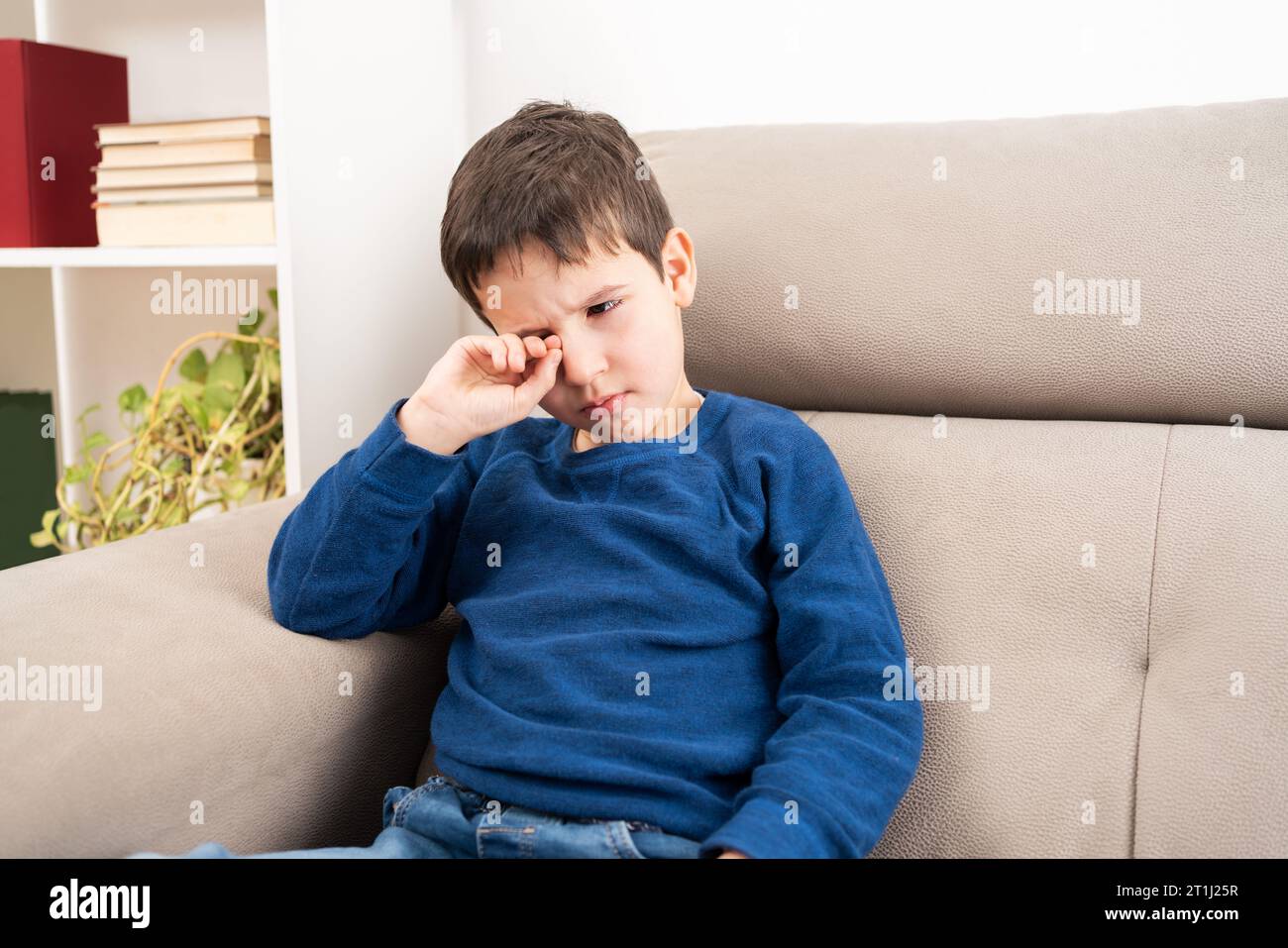 Close up of child scratching itchy eye at home Stock Photo - Alamy