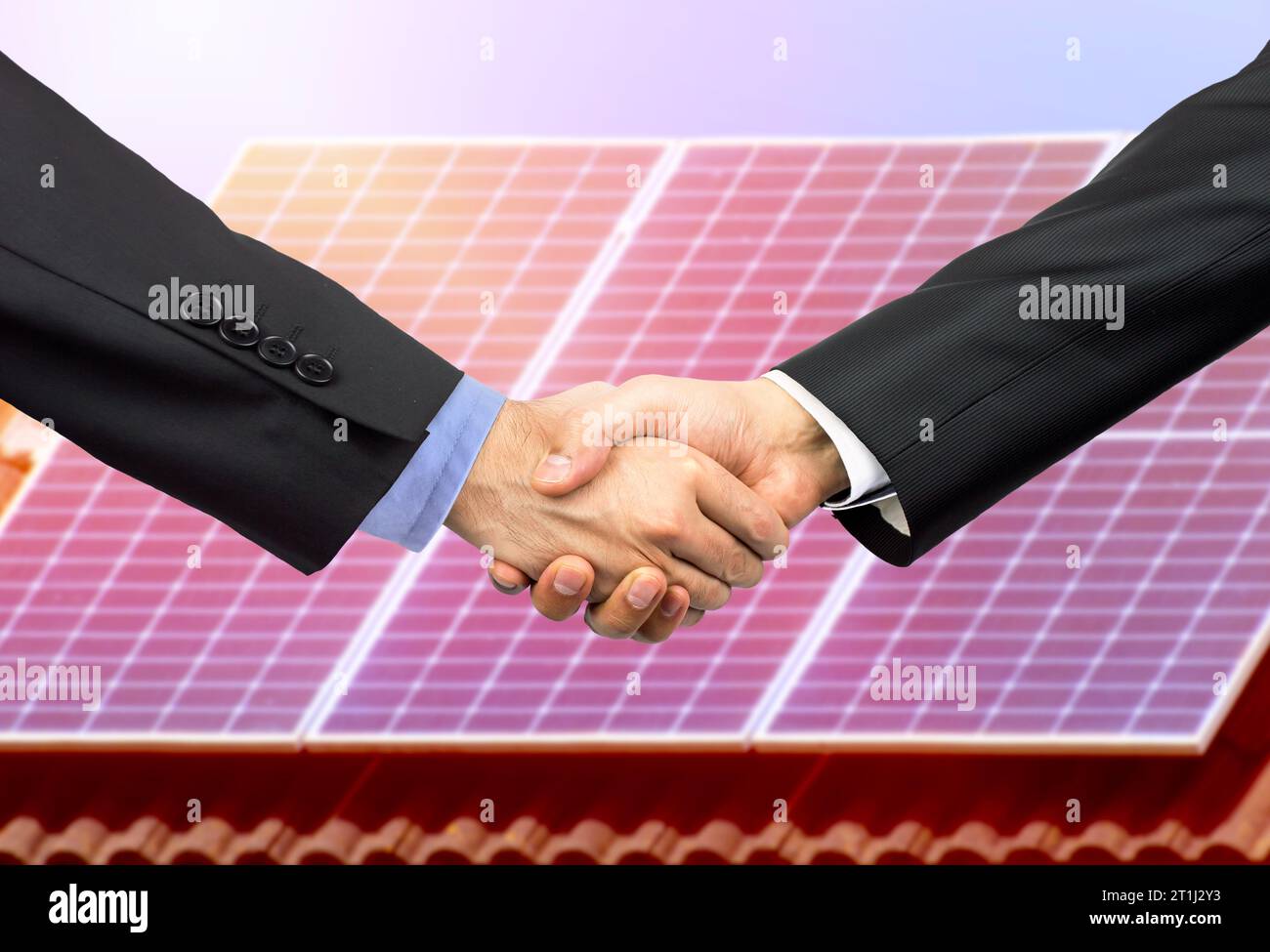Handshake, engineering and teamwork with people and solar panels for ...