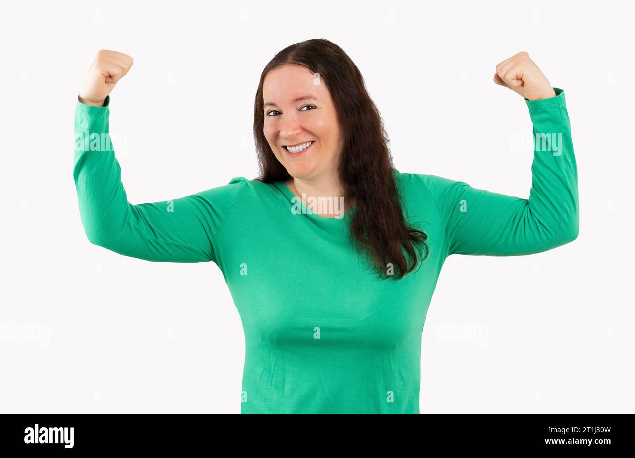 Beautiful woman wearing casual green t-shirt standing over isolated ...