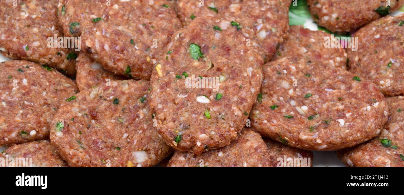 Raw beef meatballs made with various homemade spices, beef kofte kofta ...