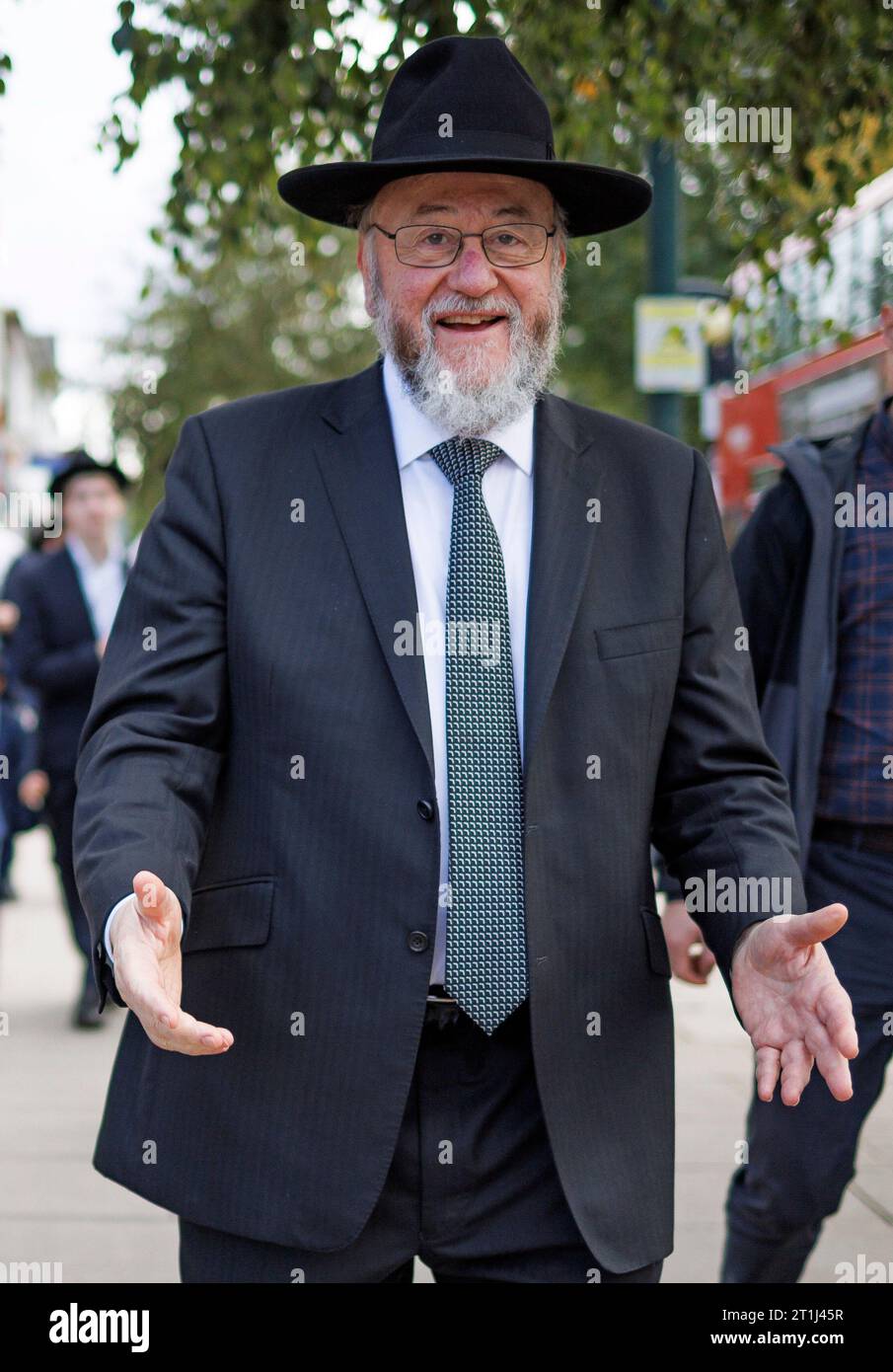 London, UK. 14th Oct, 2023. Chief Rabbi Ephraim Mirvis is seen leaving ...