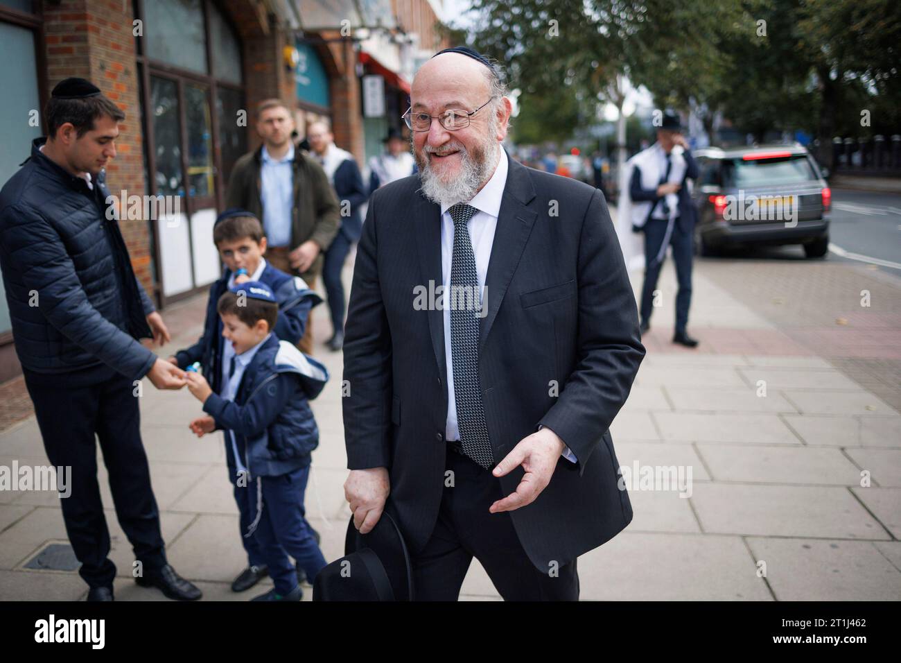London, UK. 14th Oct, 2023. Chief Rabbi Ephraim Mirvis is seen leaving ...