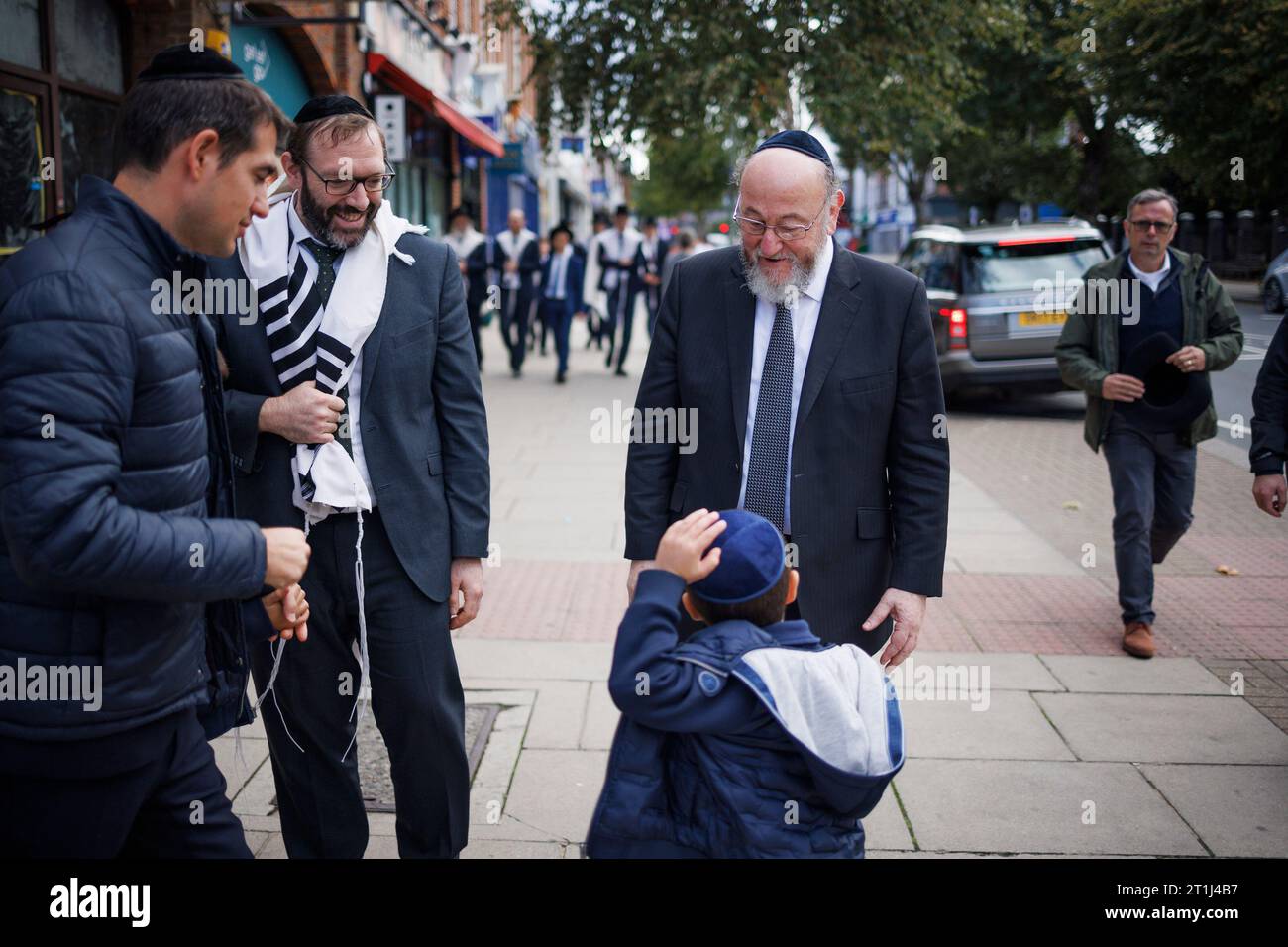 London, UK. 14th Oct, 2023. Chief Rabbi Ephraim Mirvis is seen taking ...