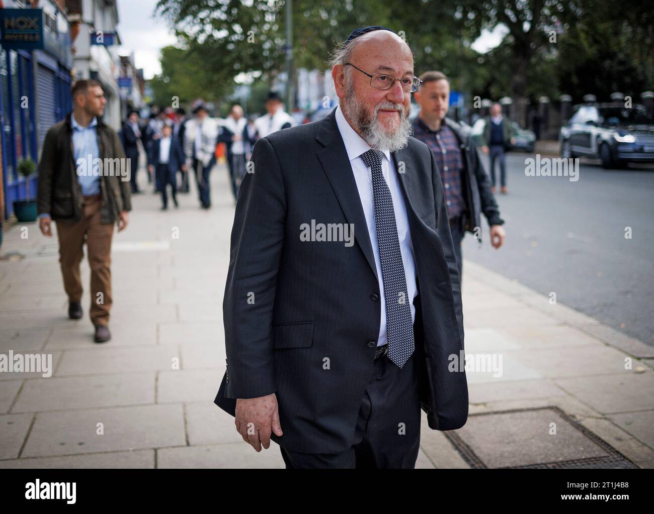 London, UK. 14th Oct, 2023. Chief Rabbi Ephraim Mirvis is seen leaving ...