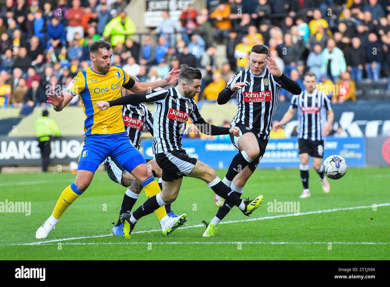 Dan Crowley of Notts County shoots and scores a goal to make it 1-0 ...