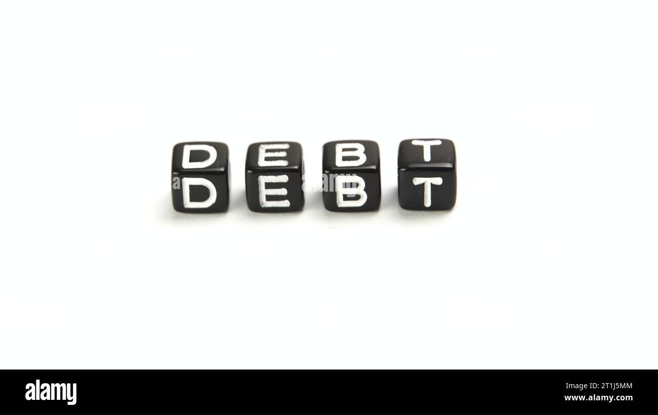 Debt - Business Vocabulary Word on Black Dice isolated on white ...