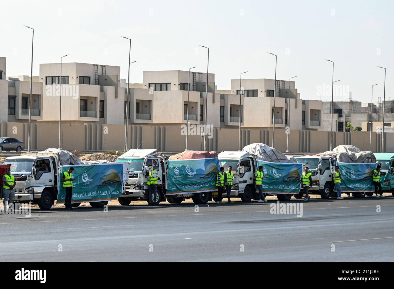 Cairo, Egypt. 14th Oct, 2023. Aid convoy trucks loaded with supplies, sent by Egypt, are seen at ...