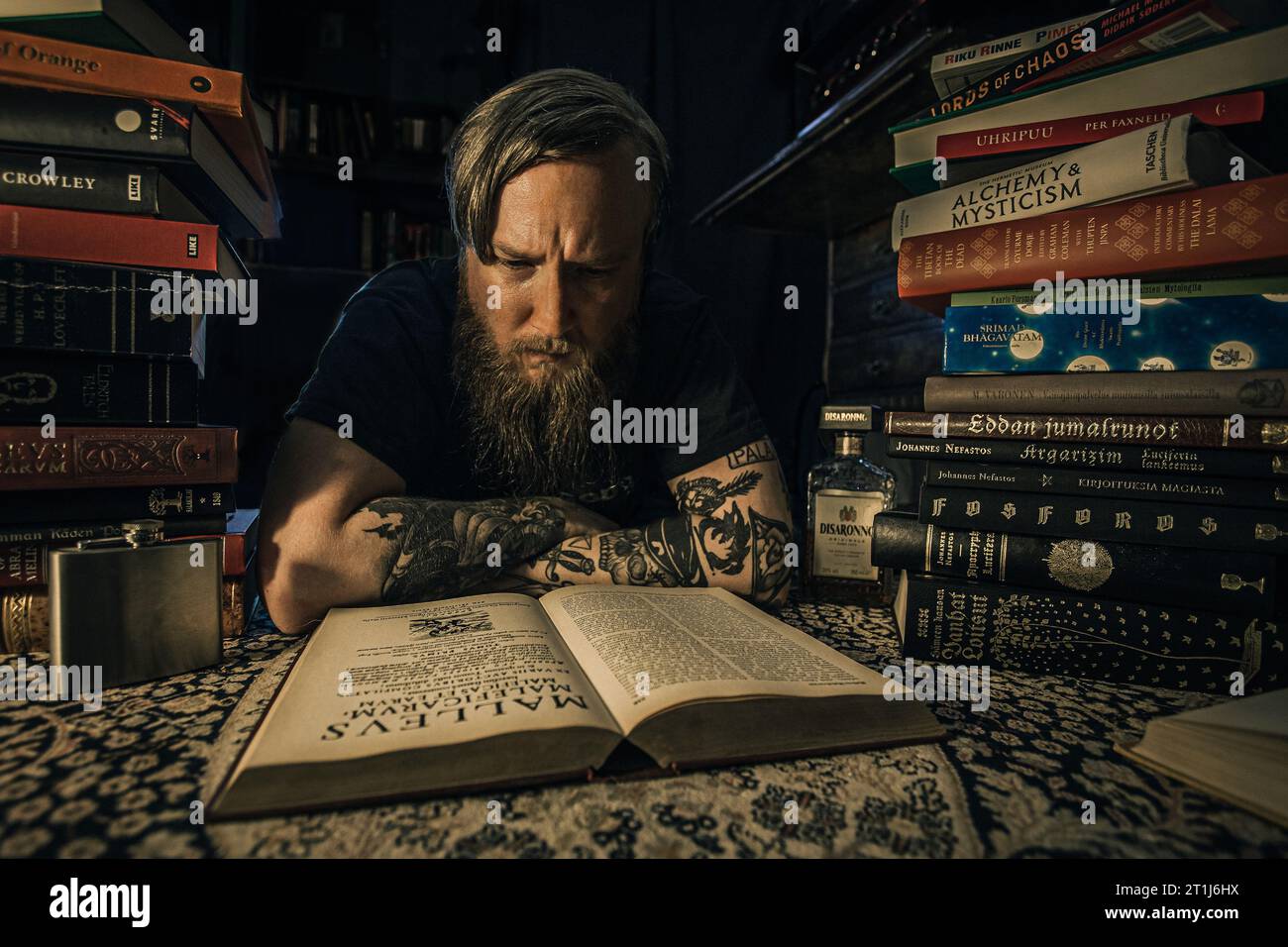 Reading mystical books Stock Photo - Alamy