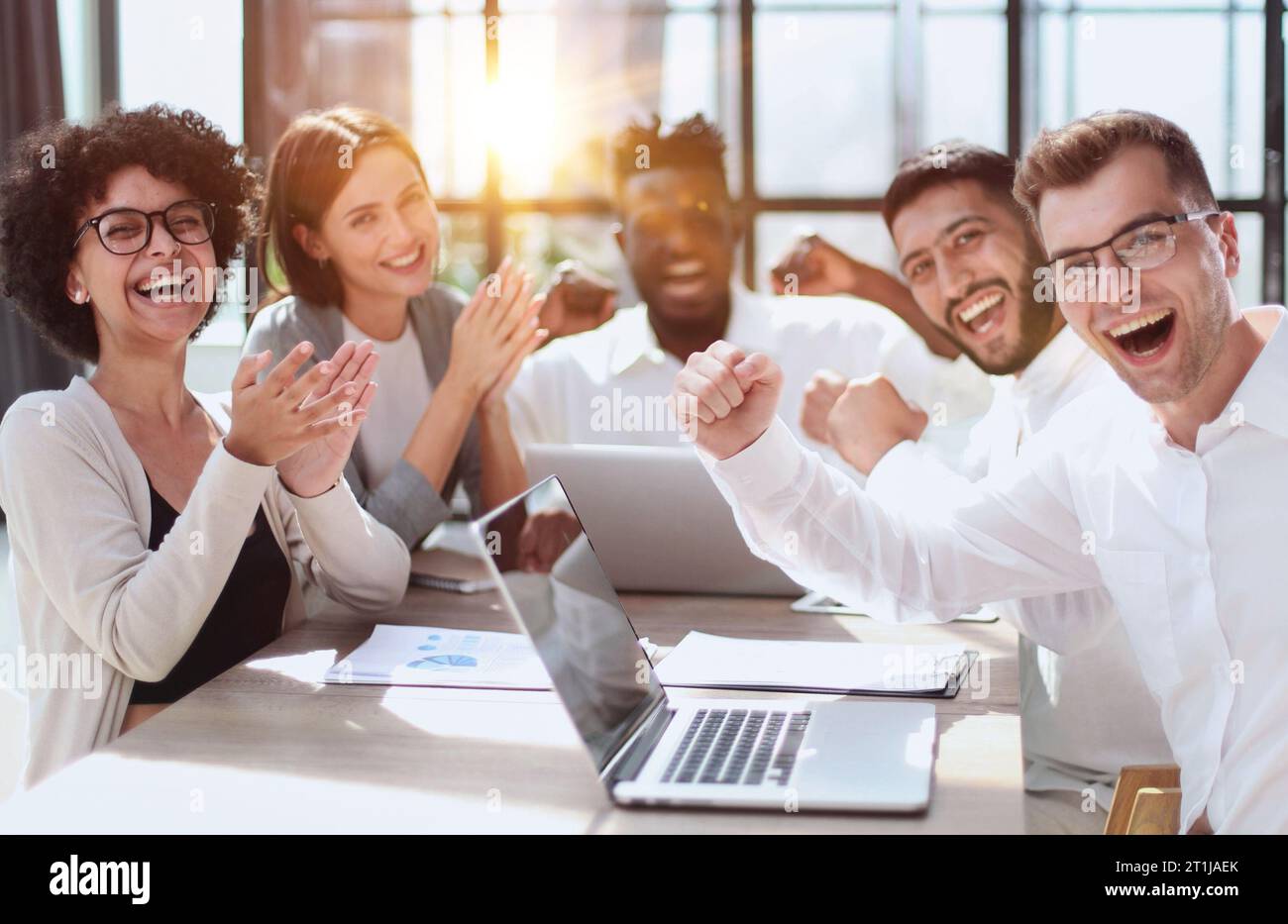 Smiling professional business leaders and employees group team portrait ...