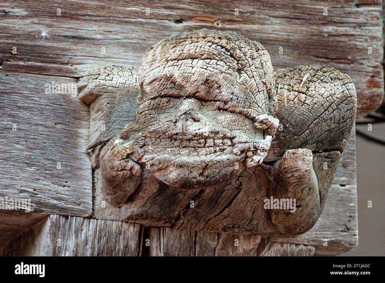 A medieval carved wooden beam in the town of Mirepoix, Aude Stock Photo ...