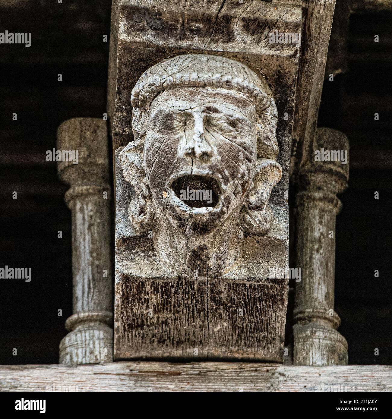 A medieval carved wooden beam in the town of Mirepoix, Aude Stock Photo ...
