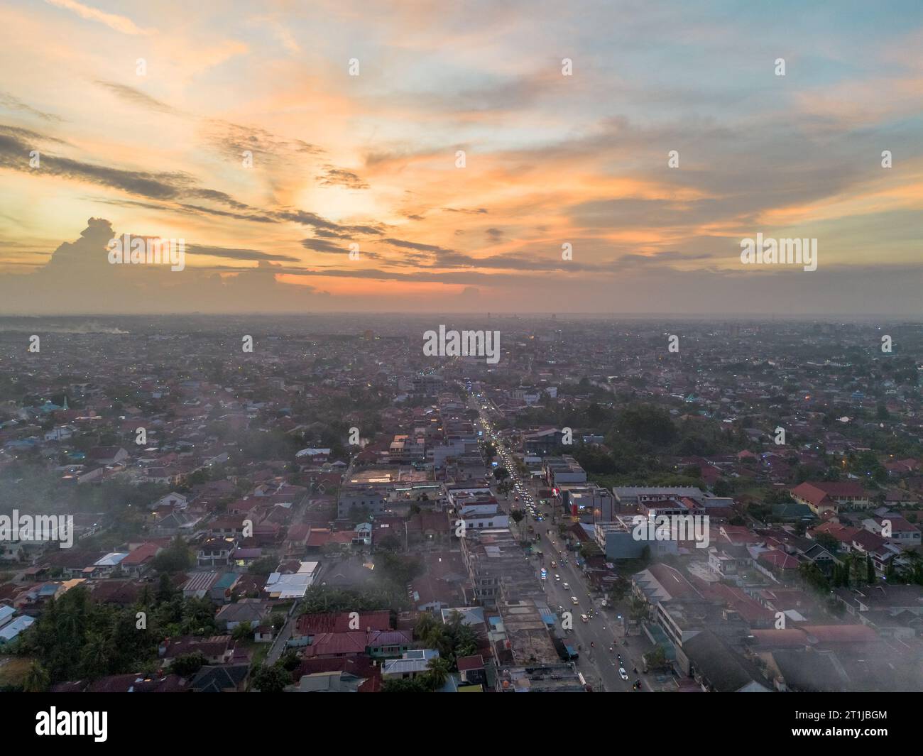 Aerial view of Pekanbaru city skyline during sunset. Capital city of ...