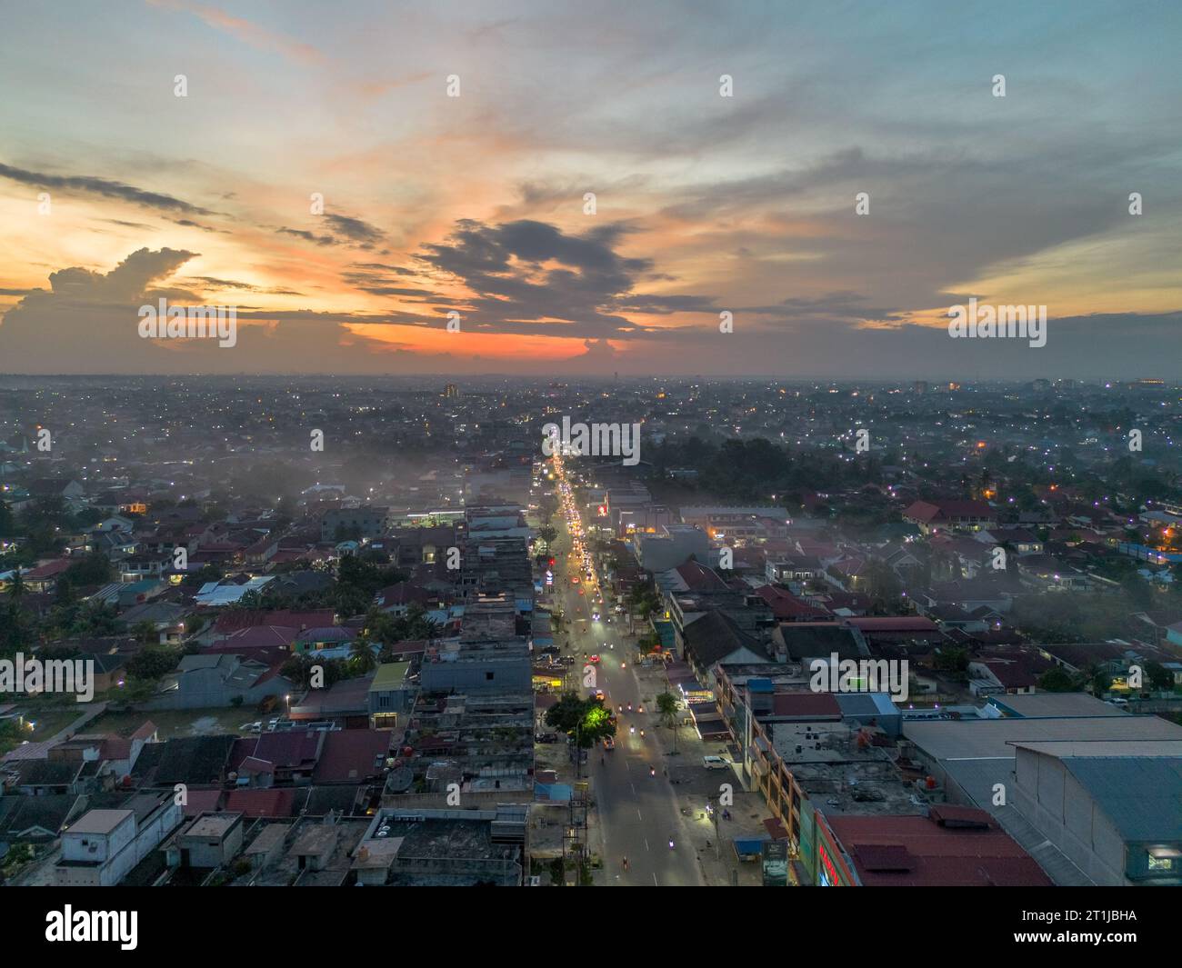 Aerial view of Pekanbaru city skyline during sunset. Capital city of ...