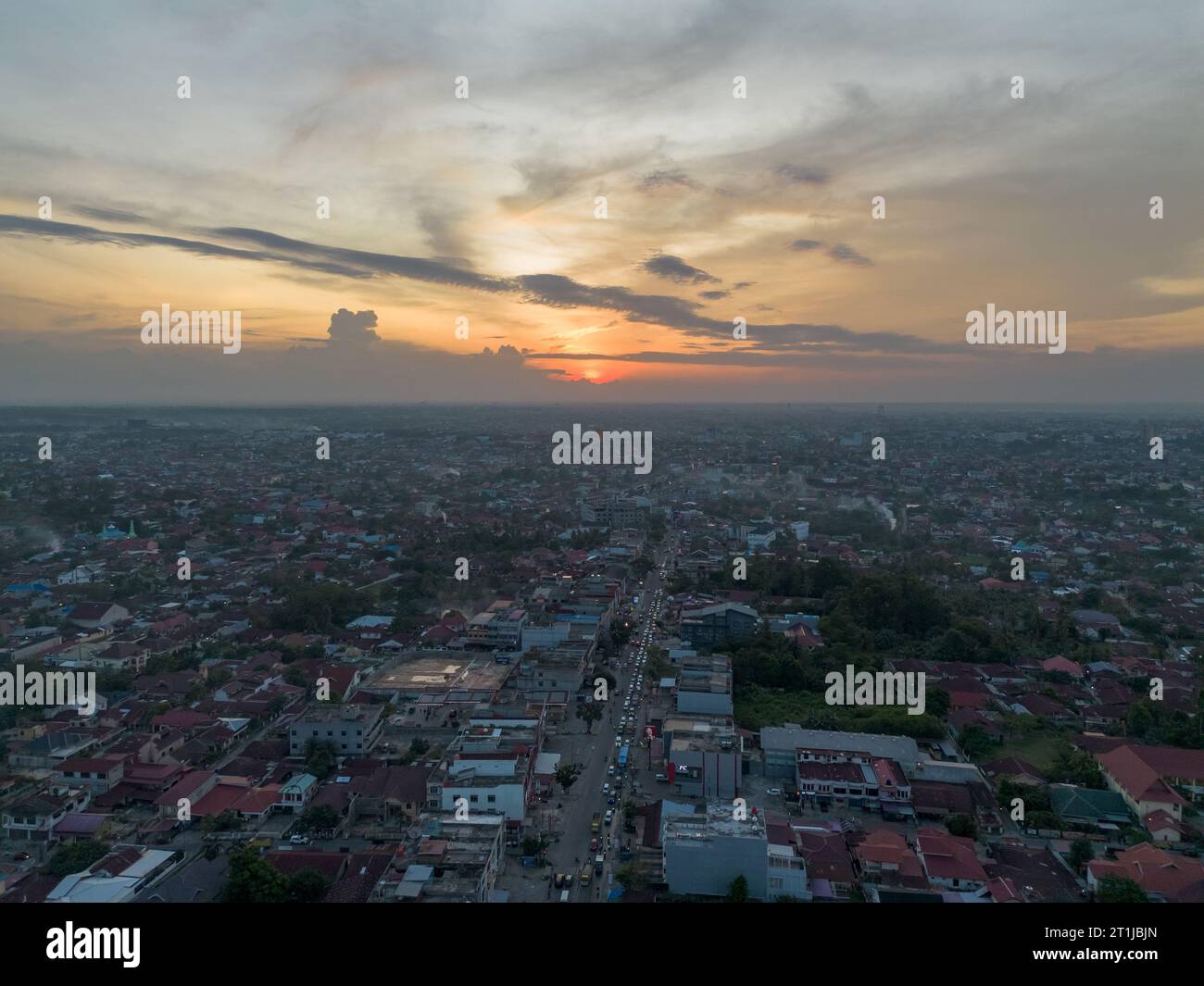 Aerial view of Pekanbaru city skyline during sunset. Capital city of ...