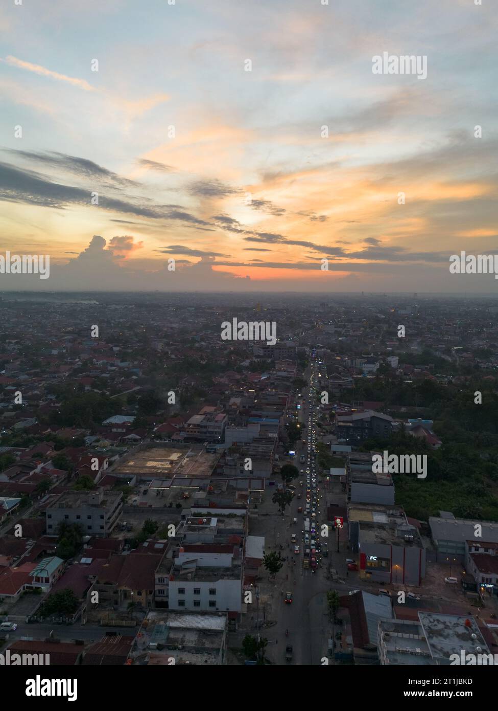 Aerial view of Pekanbaru city skyline during sunset. Capital city of ...