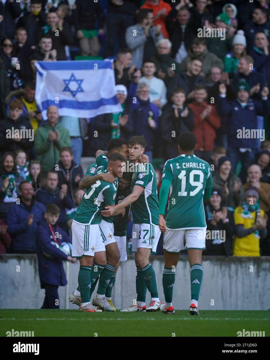 Northern Ireland's Josh Magennis (second left) celebrates with his team ...