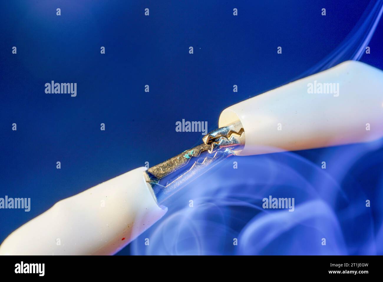 Electric wire and smoke is meant to symbolize blown insulation or ...