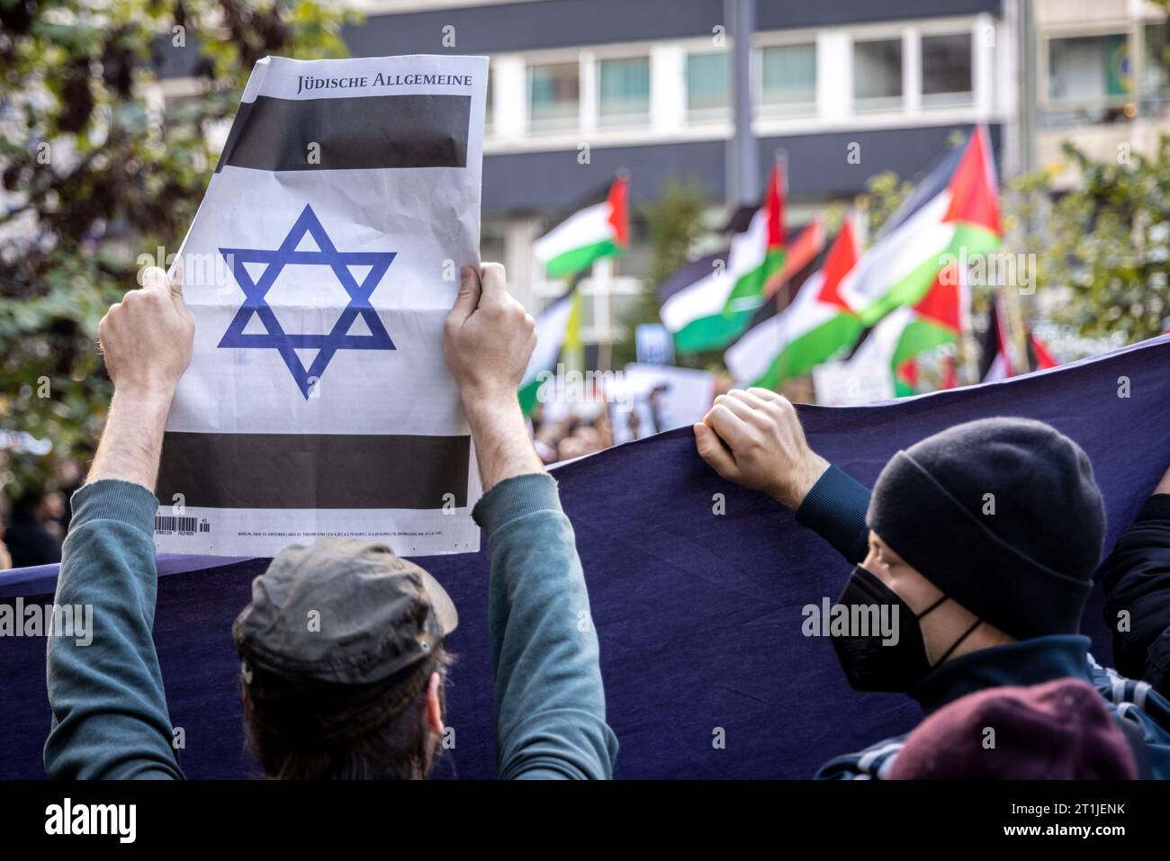 Duesseldorf, Germany. 14th Oct, 2023. A pro-Israel counter-demonstrator ...
