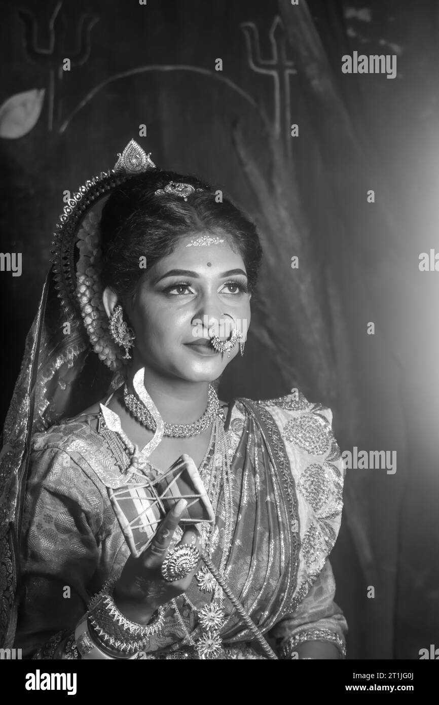 Portrait of beautiful Indian girl of Durga Idol Agomoni Concept Indoor ...