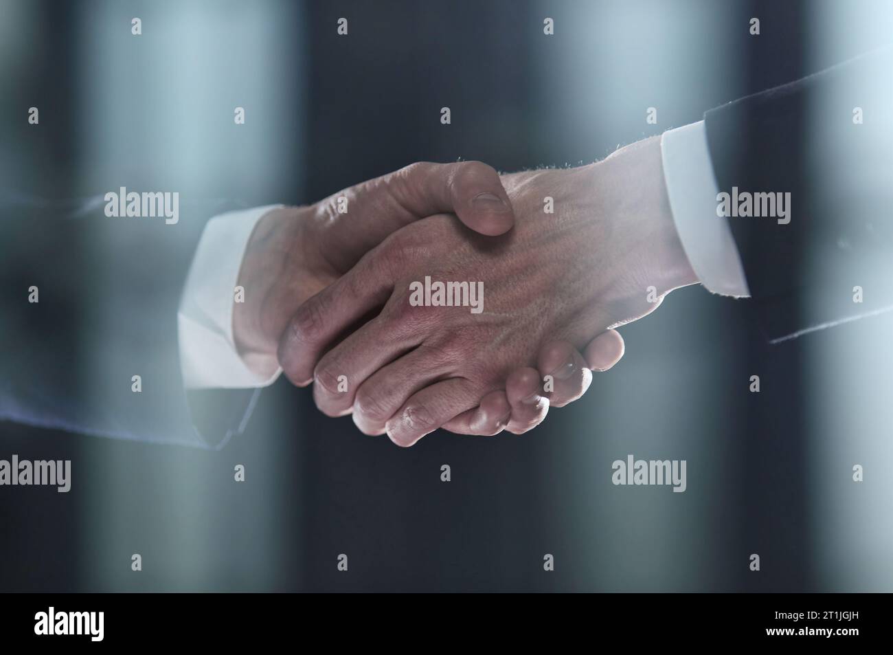 Strong handshake between corporate business hi-res stock photography ...