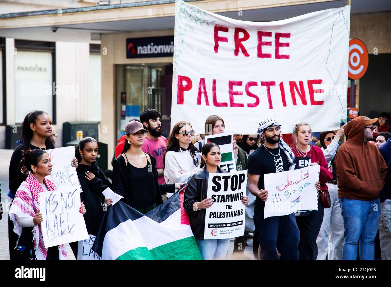 Free Palestine protest Exeter city centre - group of protestors hold ...