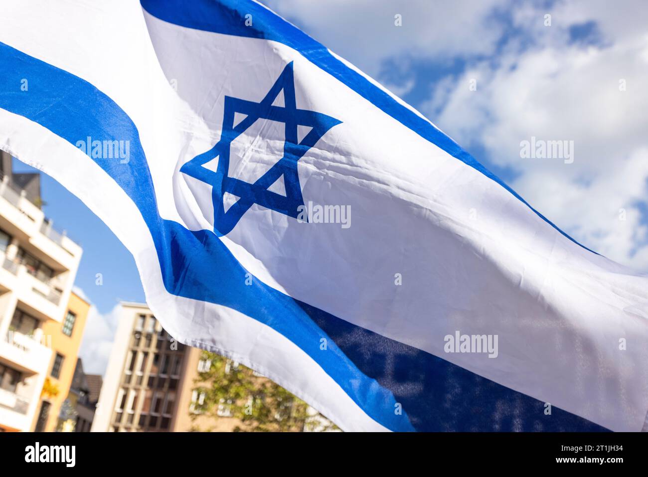 Cologne, Germany. 14th Oct, 2023. An Israeli flag flies during the ...