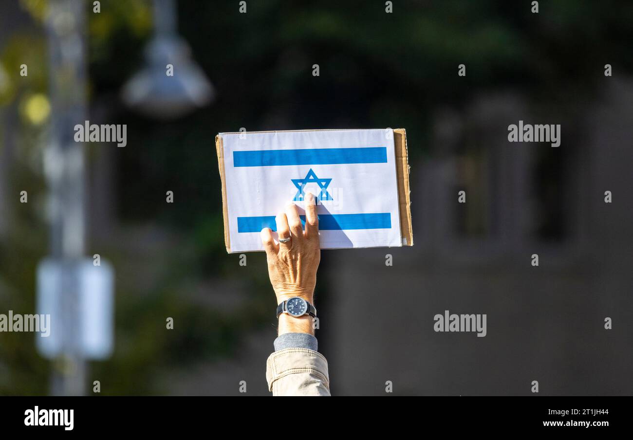 Cologne, Germany. 14th Oct, 2023. A participant of the rally "Stand up ...