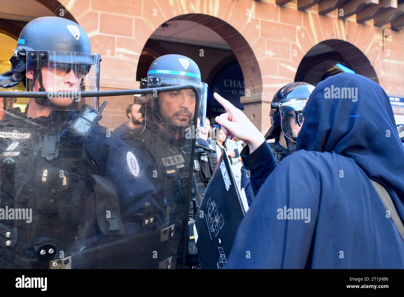Protesters participate in an unauthorized demonstration in solidarity ...