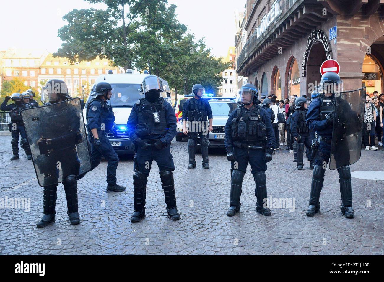 Protesters participate in an unauthorized demonstration in solidarity ...