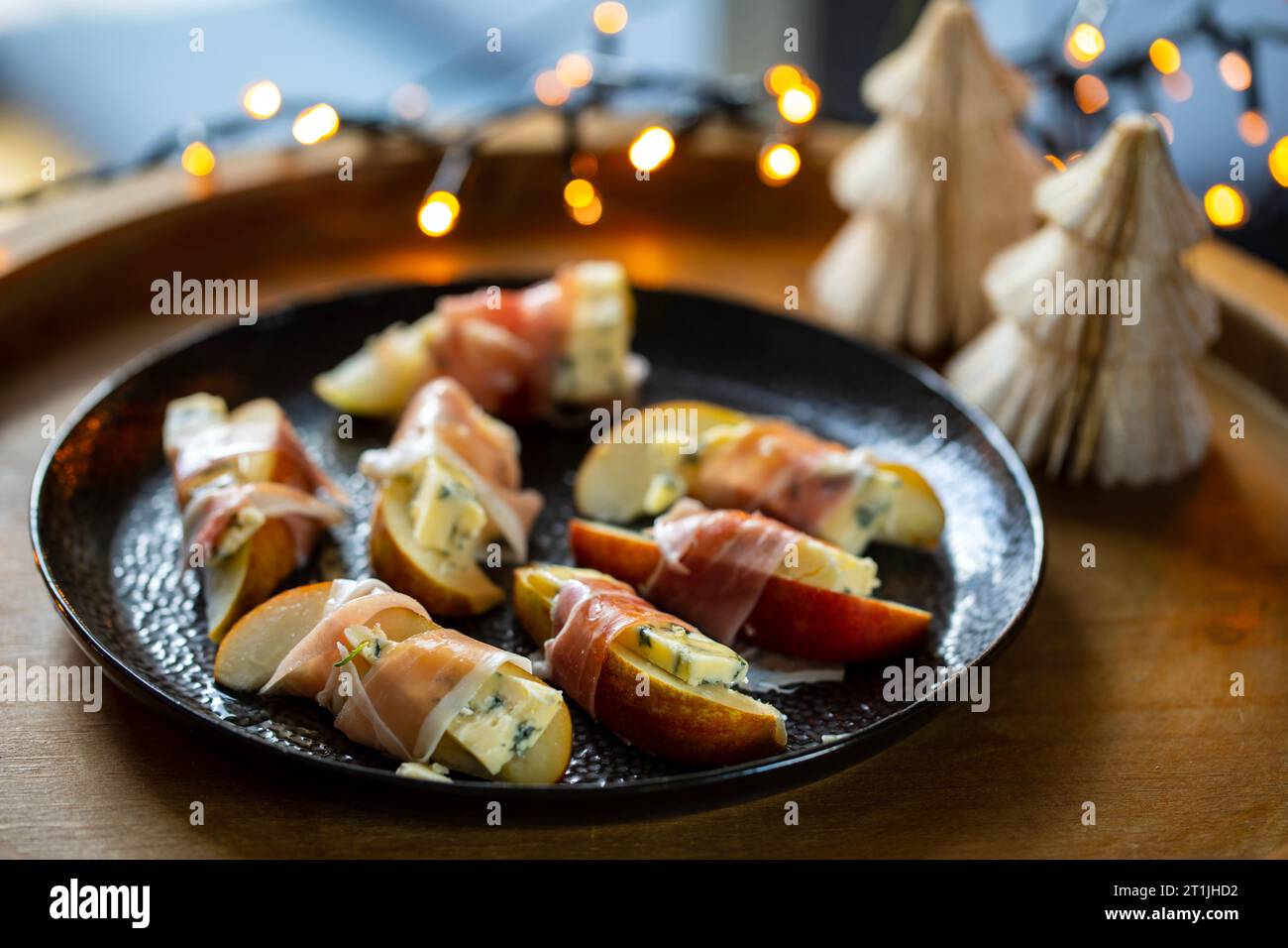Christmas canapes made of pears, blue cheese and Parma ham Stock Photo ...