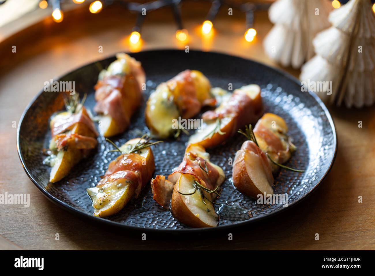 Christmas canapes made of pears, blue cheese and Parma ham Stock Photo ...