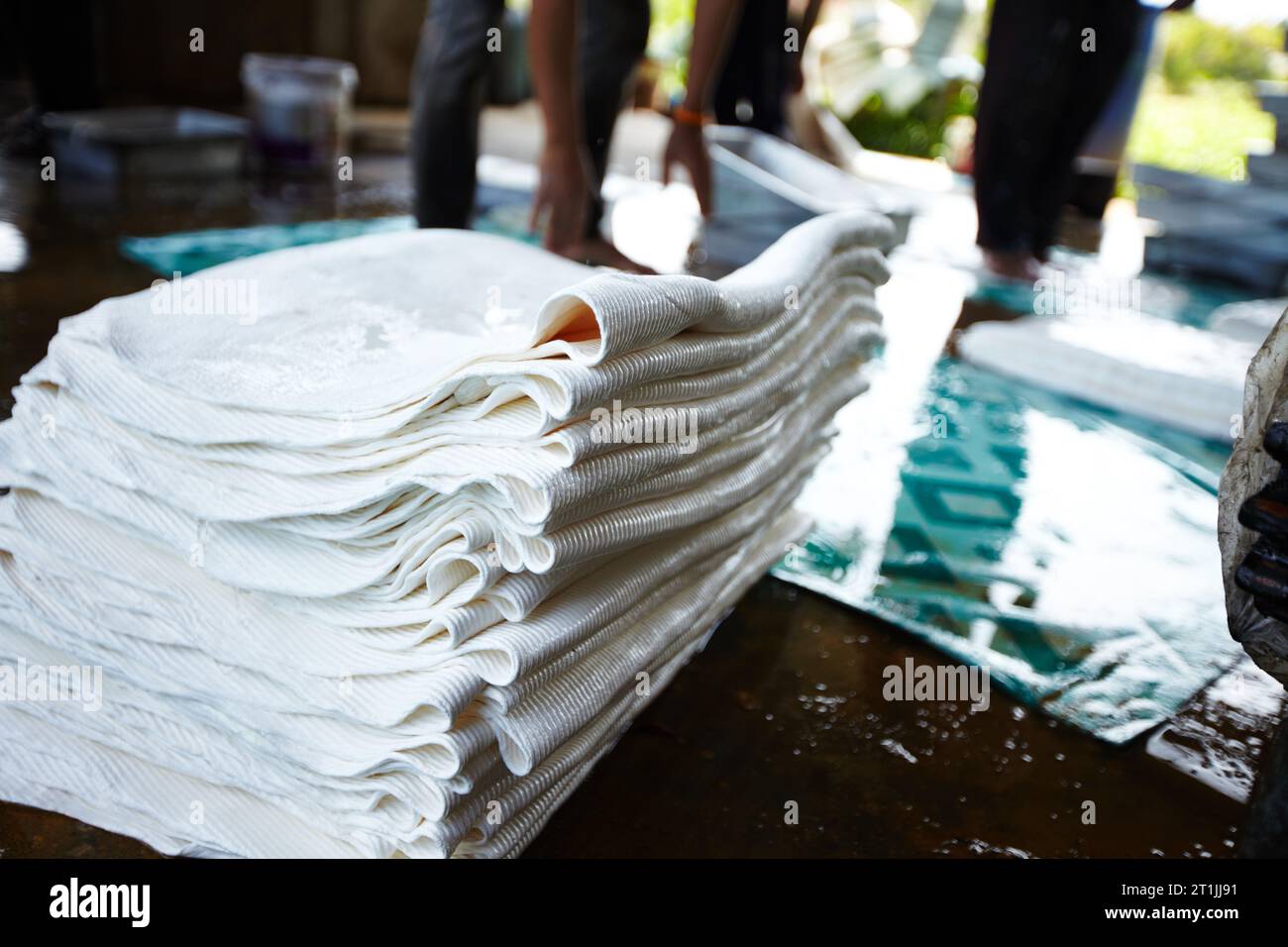 Rubber, manufacturing and closeup of sheet in workshop, factory and ...