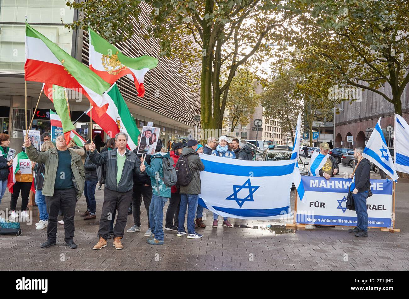 Hamburg, Germany. 14th Oct, 2023. Demonstrators carrying flags of pre ...