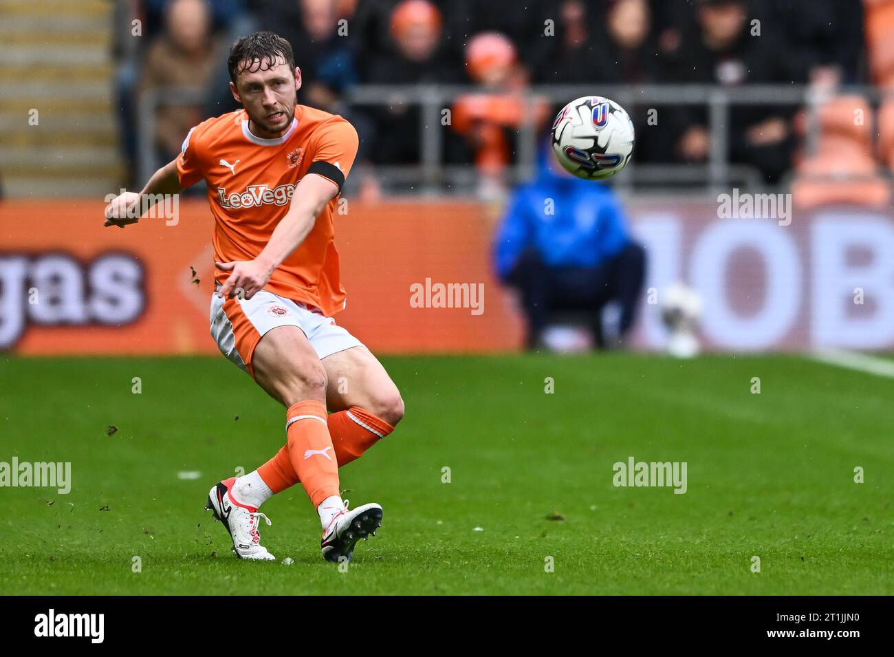 Matthew Pennington #5 of Blackpool passes the ball during the Sky Bet ...