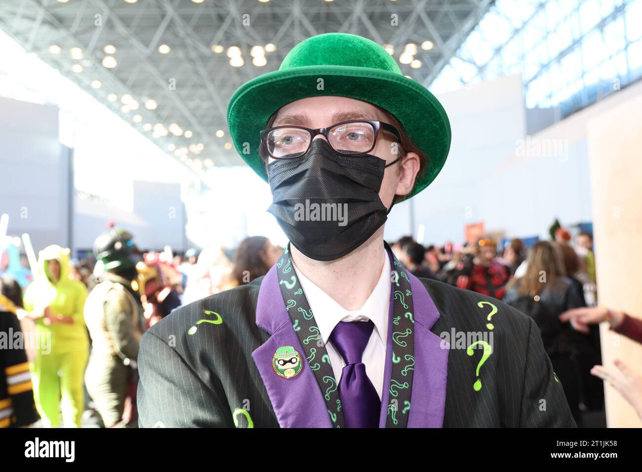 A cosplayer dressed as the Riddler from the Batman comics attends New ...