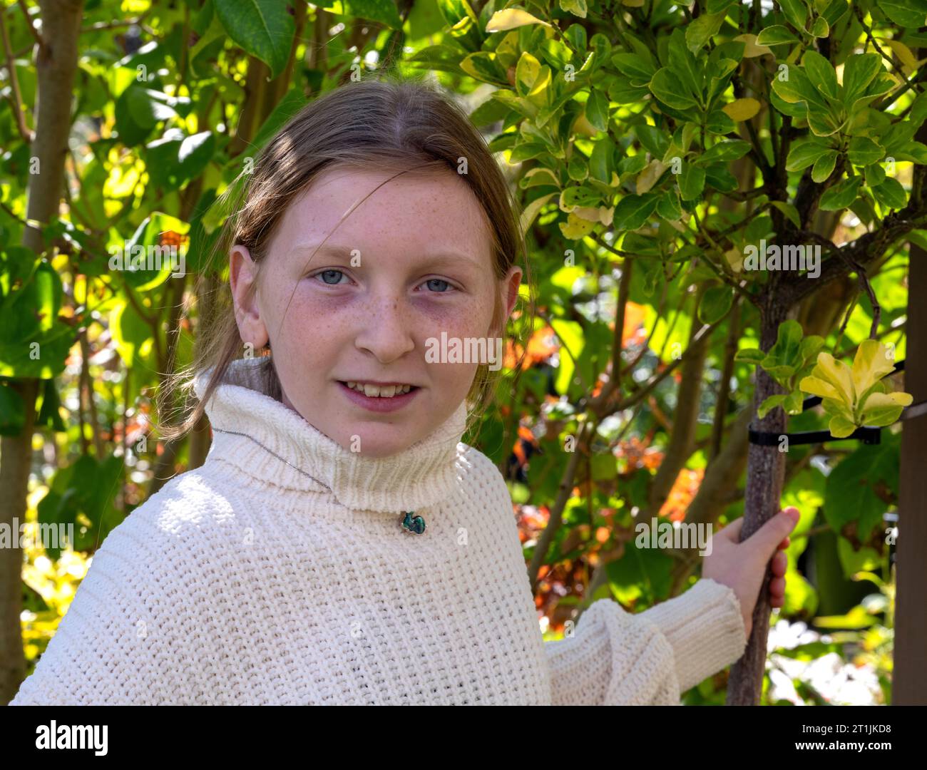 Young English girl posing for camera Stock Photo - Alamy