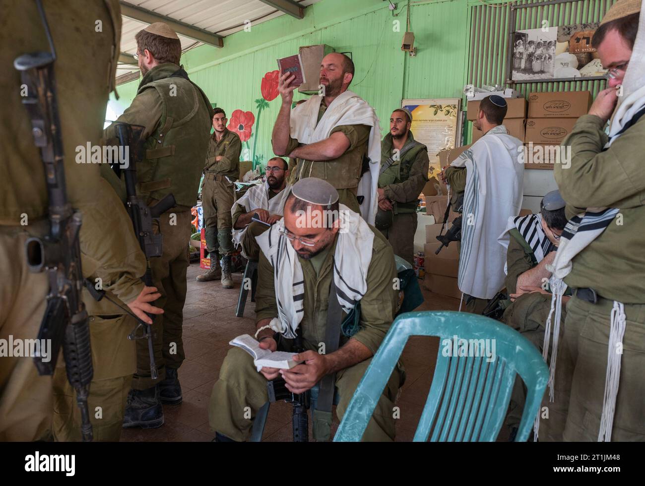Israeli defense Forces (IDF) soldiers perform morning prayers on a ...