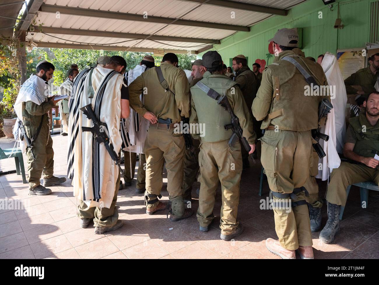 Israeli defense Forces (IDF) soldiers perform morning prayers on a ...