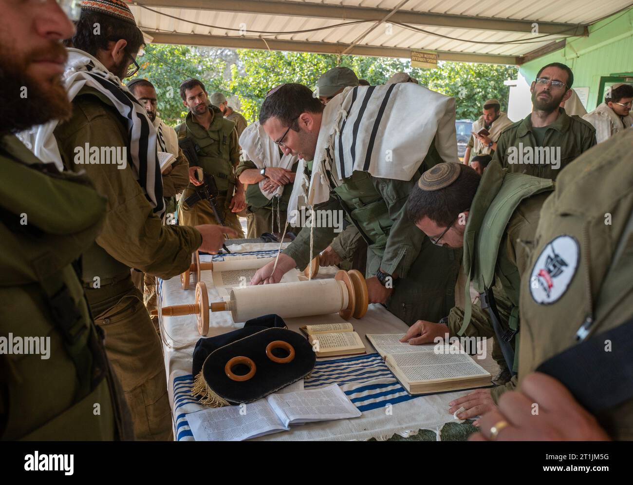 Israeli defense Forces (IDF) soldiers perform morning prayers on a ...