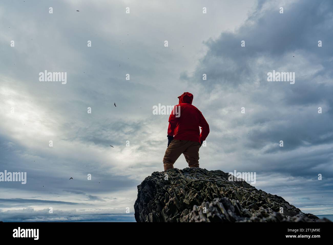 Hiker in red jacket standing hi-res stock photography and images - Alamy