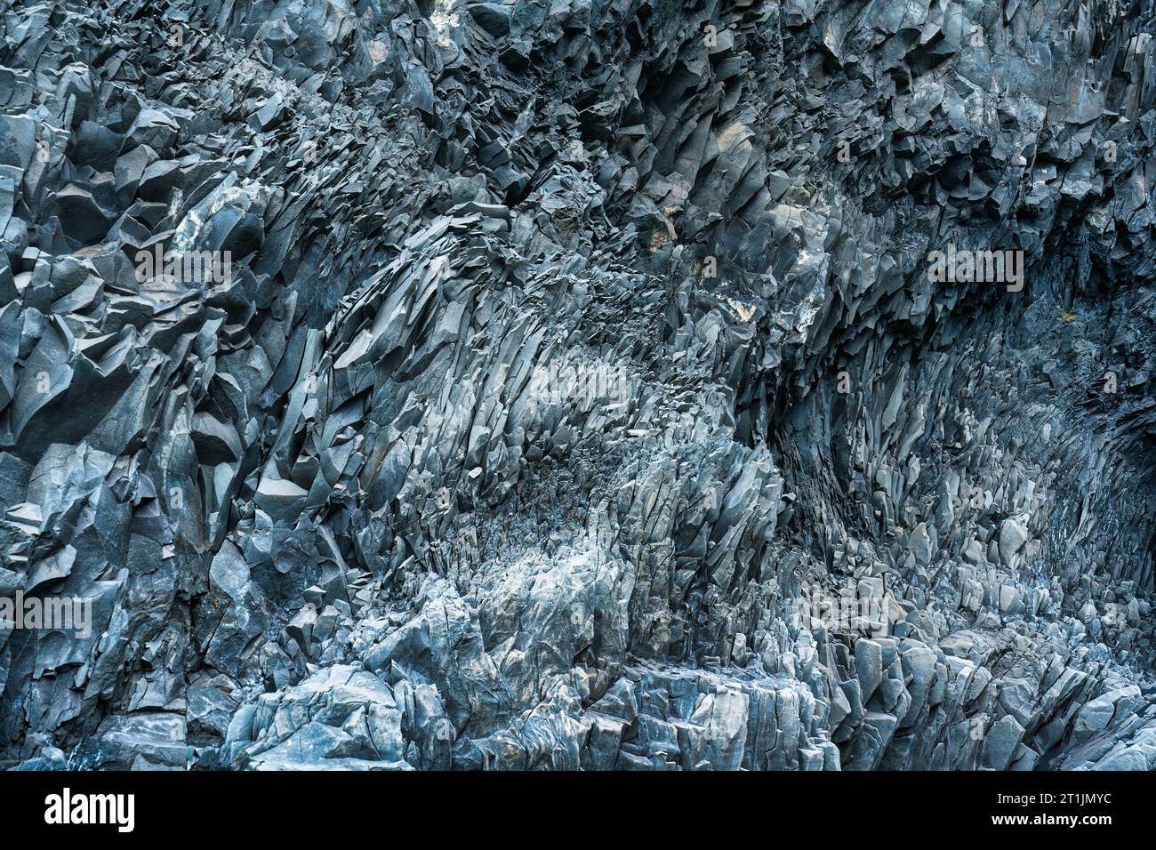 Abstract Icelandic rugged basalt rock natural wall pattern in ...