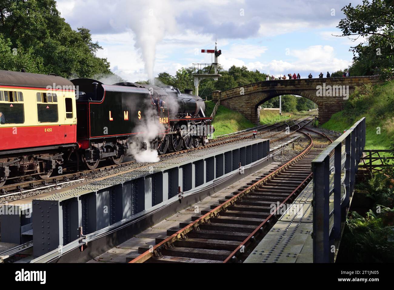 With safety valves lifting LMS Class 5 No 5428 'Eric Treacy' waits to ...