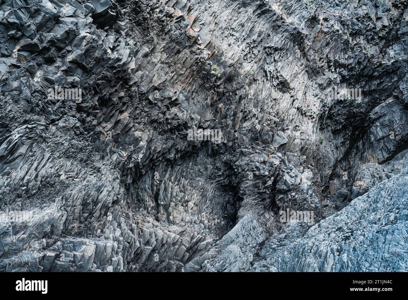 Abstract Icelandic rugged basalt rock natural wall pattern in ...
