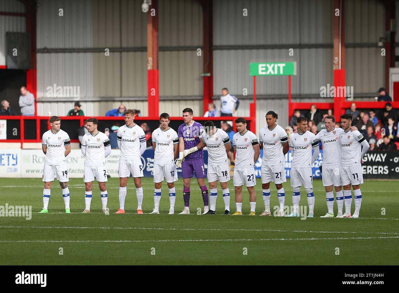 Crewe, UK. 14th Oct, 2023. Tranmere Rovers players line up for a minute ...