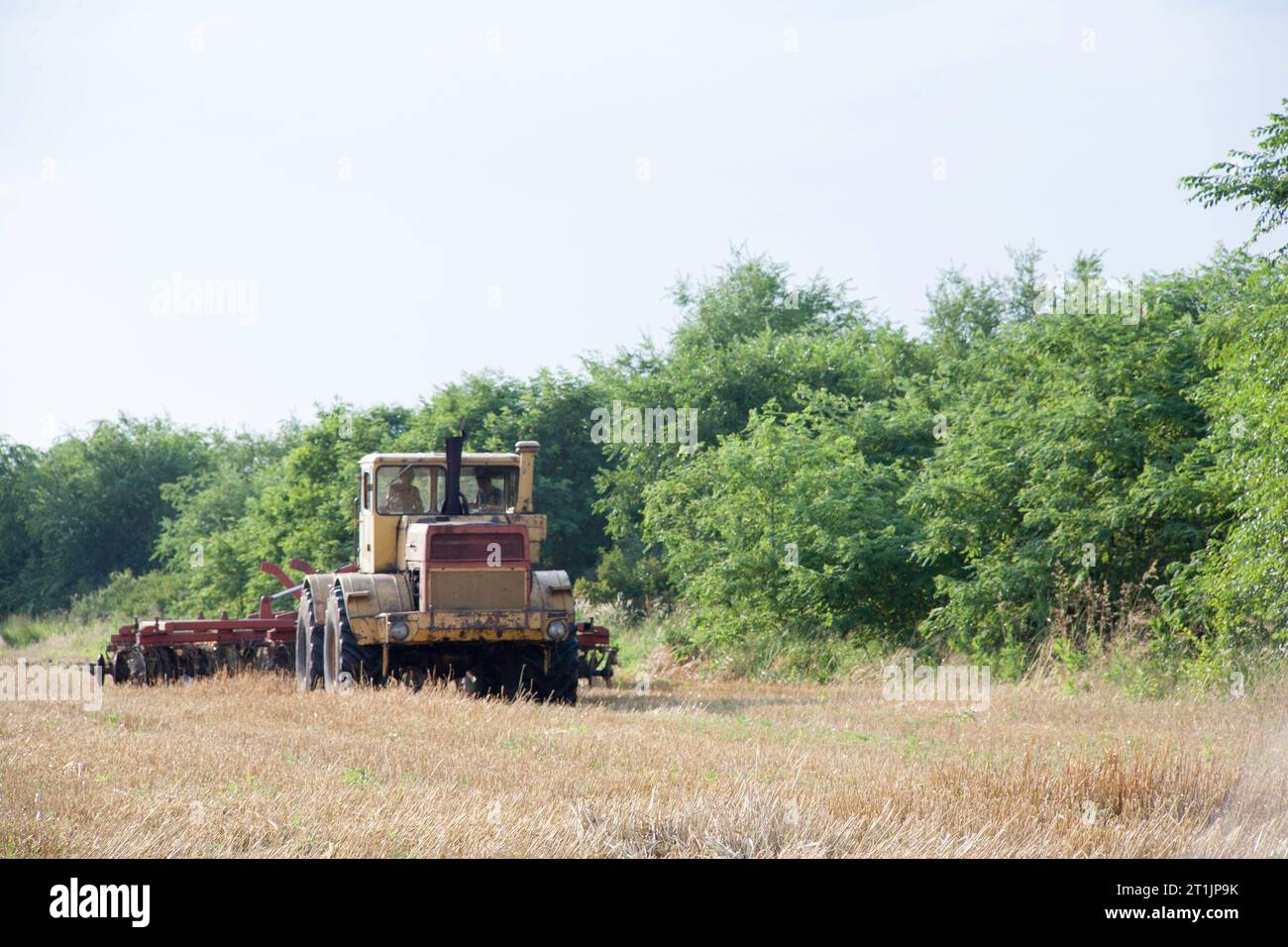 Russian tractor K-700 Kirovets. Large yellow USSR tractor designed for ...