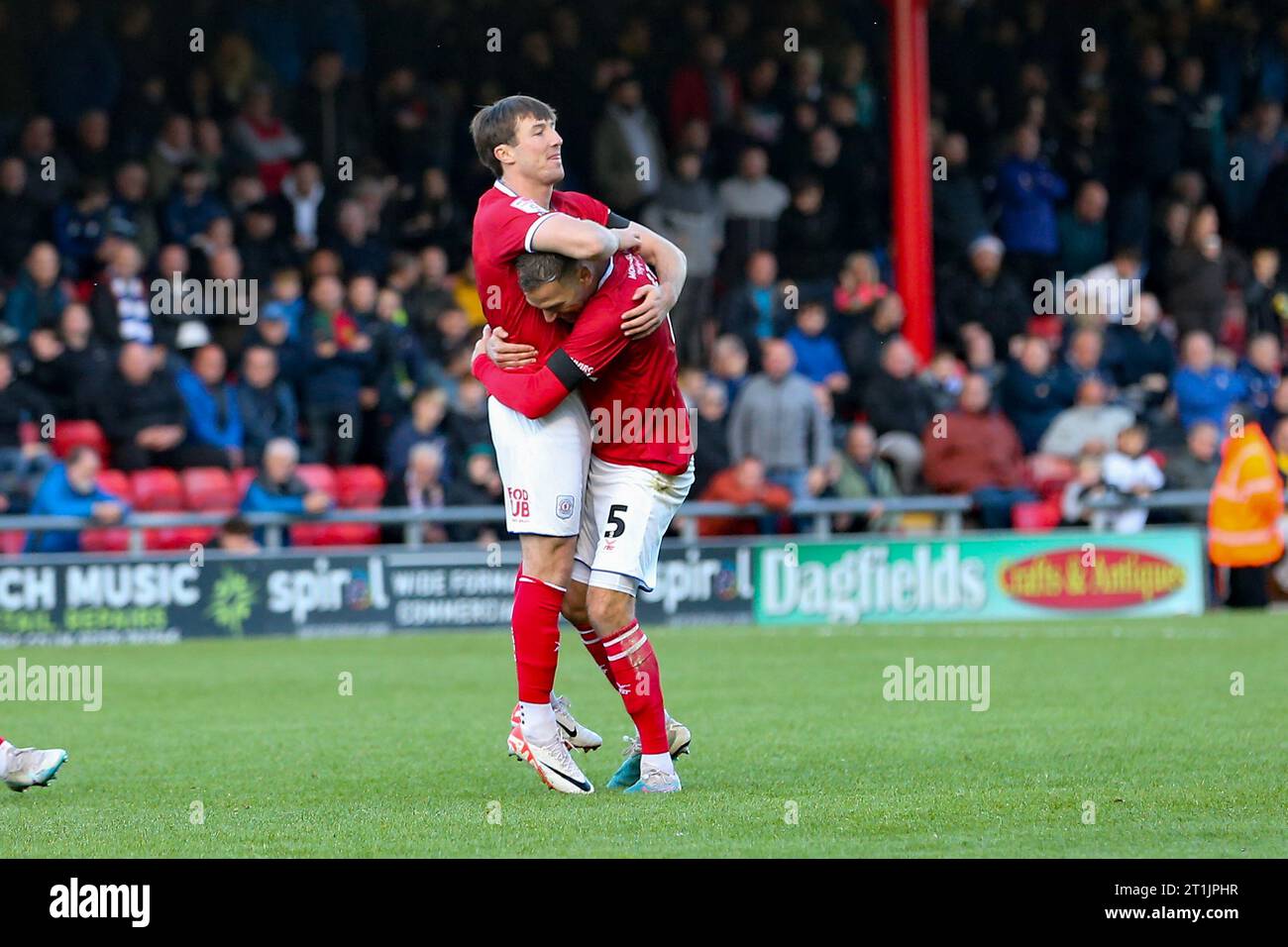 Crewe, UK. 14th Oct, 2023. Chris Long of Crewe Alexandra (l) celebrates ...