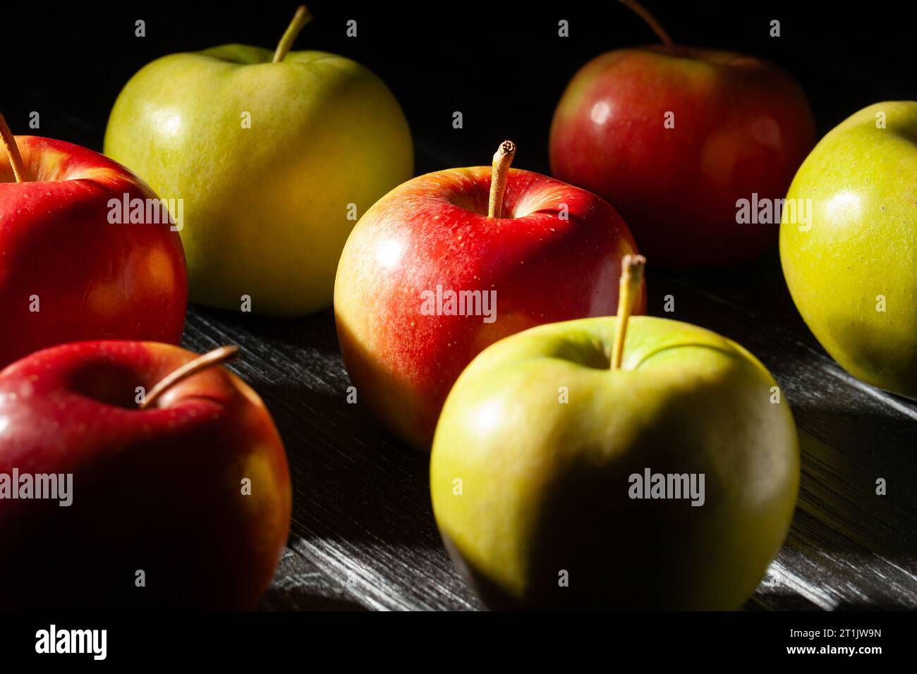 apple group on wood background Stock Photo - Alamy