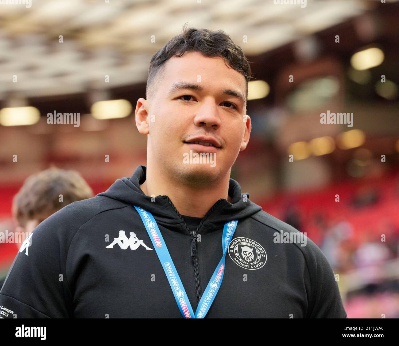 Tyler Dupree #32 of Wigan Warriors inspects the pitch before the ...